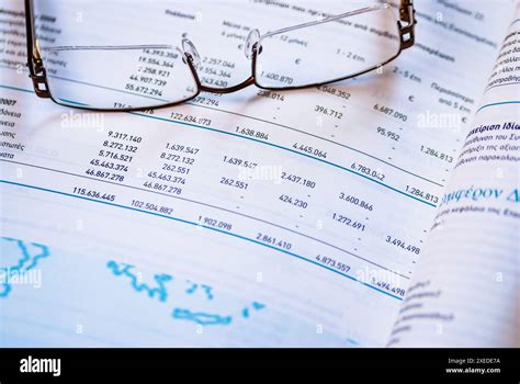 Financial Statement Spreadsheet And Eyeglasses Budget Investment