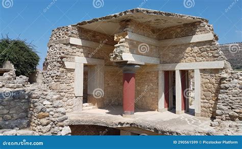 A Stone Building With A Red Column In Front Of It Stock Image Image