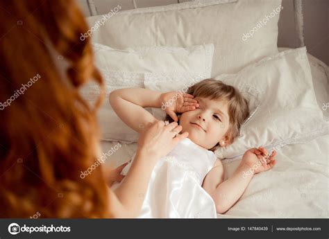 Mom Wakes Her Sleeping Daughter In The Morning Awakening — Stock