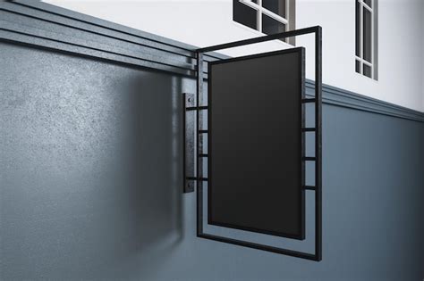 어두운 벽 야외 Mockup 3d 렌더링의 철제 프레임에 빈 검정색 간판 프리미엄 사진