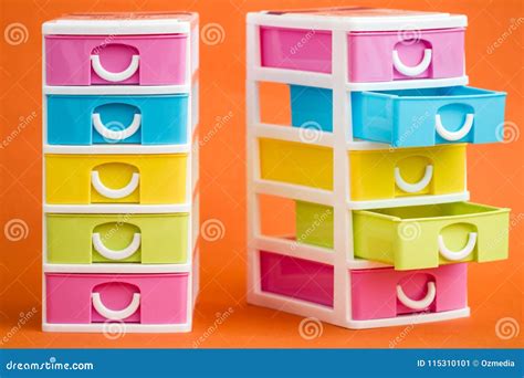 Small Cute And Colorful Plastic Drawers On Orange Stock Image Image