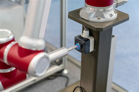 Industrial Robot Presses The Button Accuracy Calibration Stock Image
