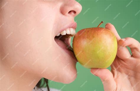 Premium Photo Female Biting An Apple Open Mouth Woman About To Bite