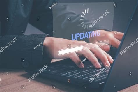 Installing Software Update Process Operating System Upgrade Concept Hand Using Laptop With