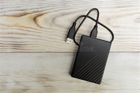 External Compact Ssd Drive With Usb Cable For Writing Reading And Storing Data On Wood Stock