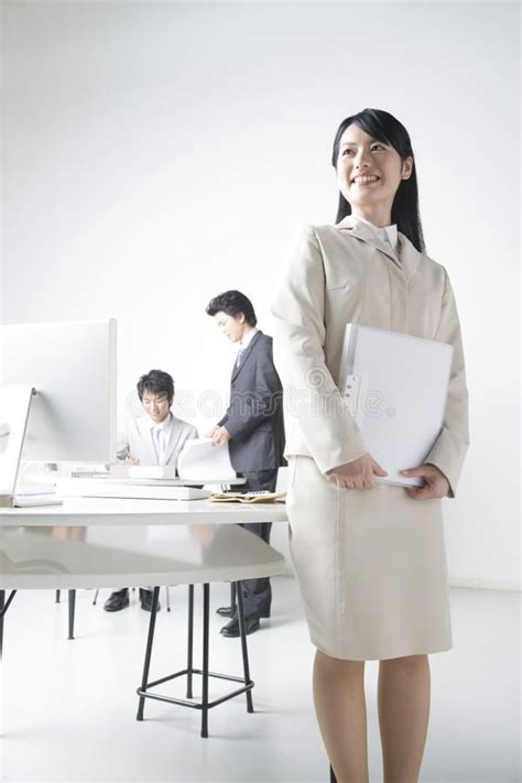 Japanese Office Lady Young Japanese Businesswoman With Document In