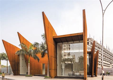 Sanjay Puris Arching Office Building Features Weathering Steel Facades