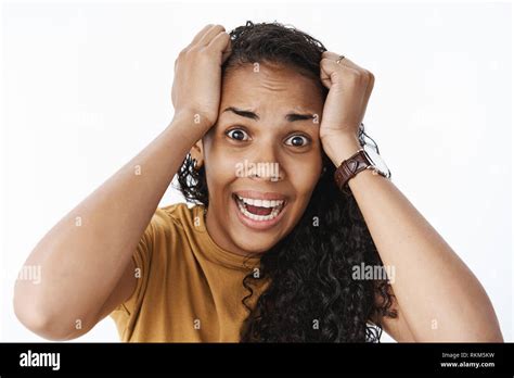 Panicking Freaked Out African American Woman Wearing Watch And T Shirt