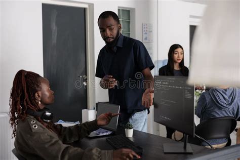 Software Programers Brainstorming Ideas To Write Html Code Stock Image