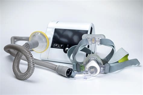 Premium Photo Continuous Positive Airway Pressure System Includes Of Cpap Machine Mask Tube On