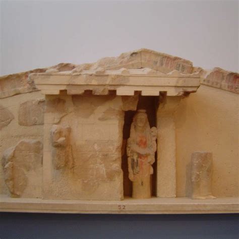 A Clay Model Of An Ekphora Burial Procession Over The Bier Is A