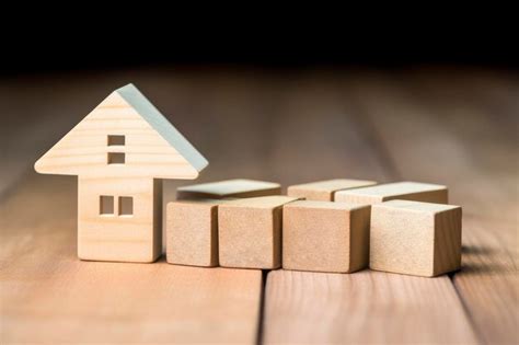 Premium Ai Image Wooden Cubes And Housing Generative Ai