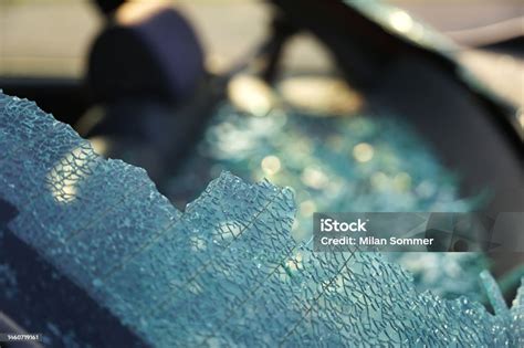 Broken Rear Window In Car During Accident Or Theft With Pieces Of Glass