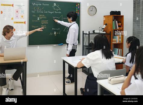 Teaching Pythagorean Theorem In Classroom With Diverse Students Stock
