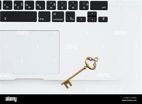 Key And Laptop Stock Photo Alamy