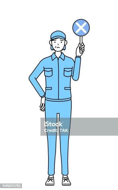 모자와 작업복을 입은 노파가 오답을 나타내는 X가 적힌 플래카드를 들고 있다 건설 현장에 대한 스톡 벡터 아트 및 기타 이미지