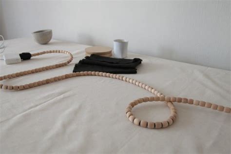 DIY How Do You Make An Extension Cord Beautiful You Bead It Remodelista Light Cord Cover