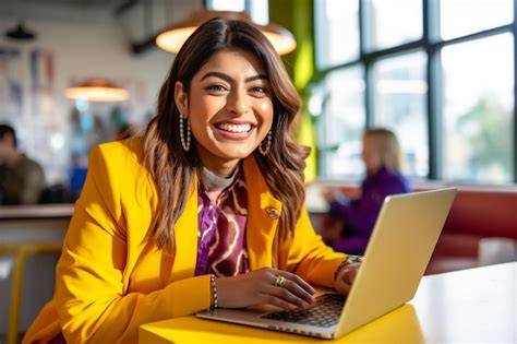 Diverse Office Portrait Of Beautiful Indian It Programmer Working On
