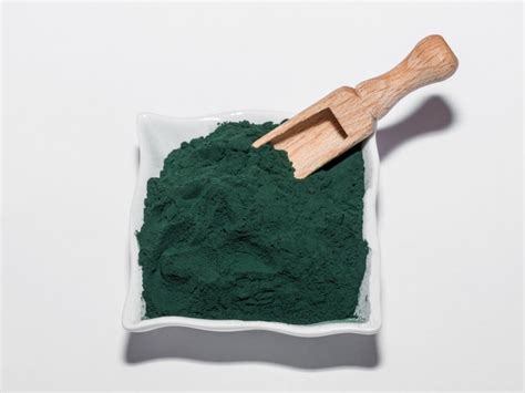 Premium Photo Close Up Of Spirulina Bacterium With Serving Scoop In
