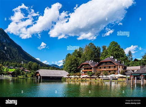 Lake Koenigssee With Buildings And Trees In The Berchtesgaden Alps