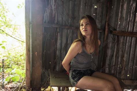 Woman Hostage Tied By Rope In Cabin Stock Photo Adobe Stock