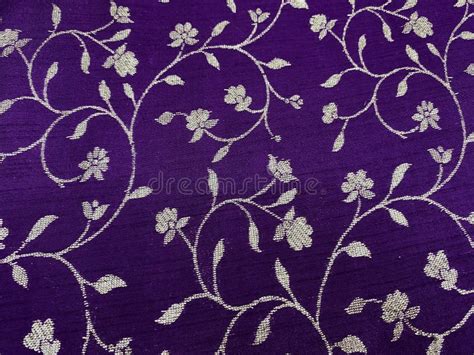 Silver Floral Woven Design On Purple Silk Brocade Fabric Stock Image