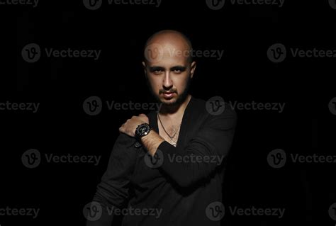 Sexual Hairless Male With Beard And Mustache In Black Shirt On Black Background 16100190 Stock