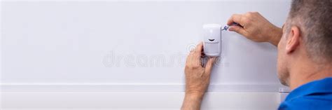 Electrician Installing Security System Door Sensor Stock Image Image