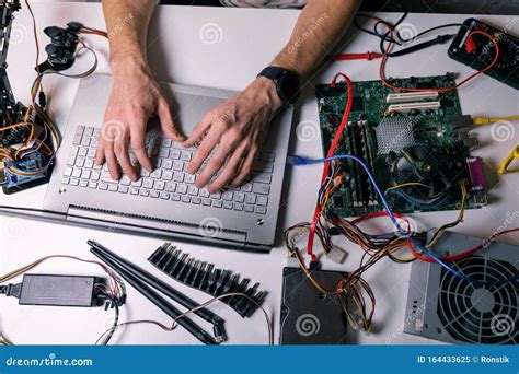 electronics technician working testing and configuring computer hardware stock image image
