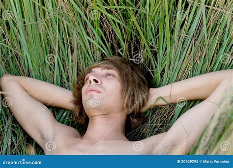 Handsome Man Lying On Grass Stock Photo Image Of Field Cheerful