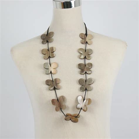 Necklace Wood Flower Disk On String Jambo Imports And Exports