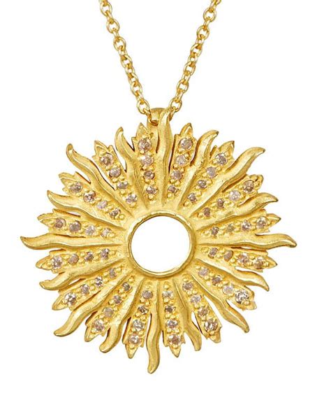 18 karat gold handmade sunburst pendant hanging on a 18 karat gold chain for sale at 1stdibs