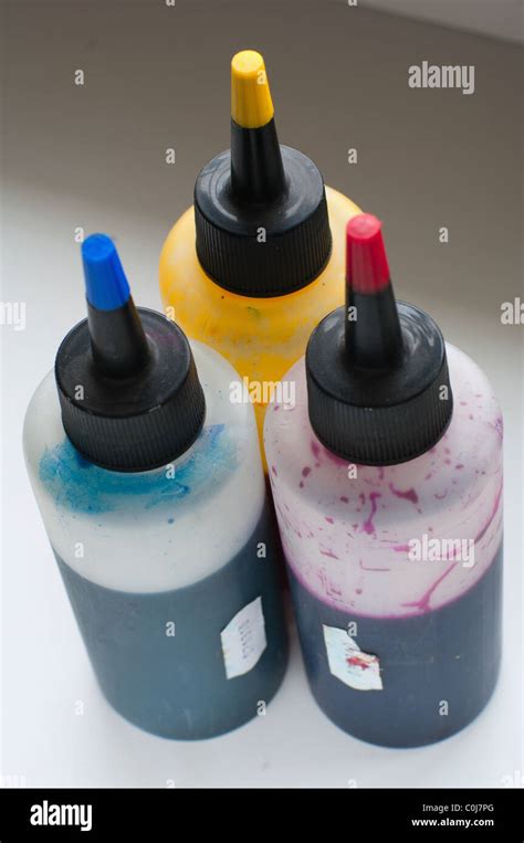 Ink And Syringes For Refilling Cartridges On A White Background Stock Photo Alamy