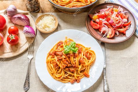 Traditional Italian Lunch Pasta Ammatricana And Salad 이미지 1009427750