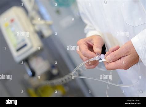 Doctor Preparing Iv Patient Hi Res Stock Photography And Images Alamy