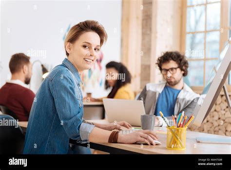 Inspired Woman Doing Her Work On The Computer Stock Photo Alamy