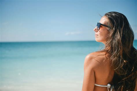 Download Tanned Brunette Girl On Beach Wallpaper