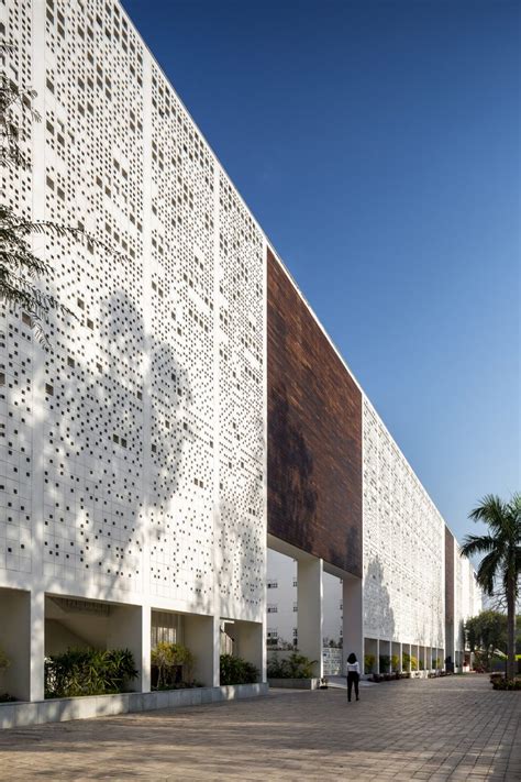 Perforated Walls And Subterranean Spaces Keep Students Cool At New