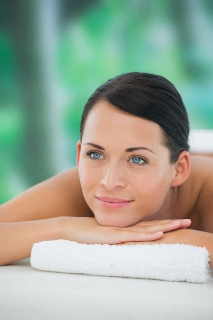 Premium Photo Beautiful Brunette Relaxing On Massage Table Smiling