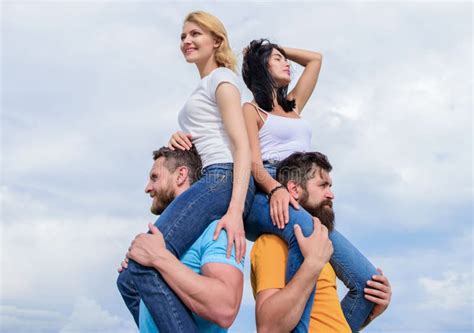 Two Playful Couples Having Great Fun At The Festival Stock Photo Image Of Human Couples
