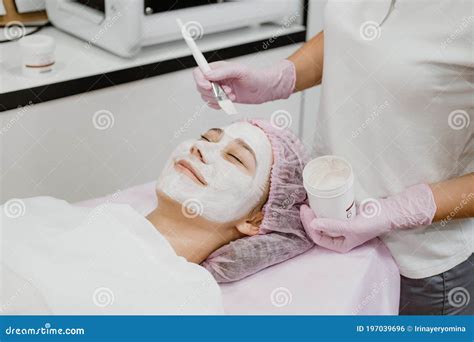 Professional Esthetician Apply Face Mask To The Client`s Face In Spa