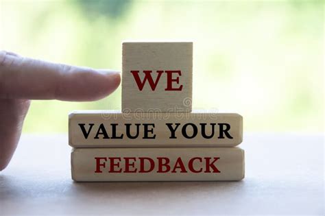 We Value Your Feedback Text On Wooden Blocks Feedback And Review