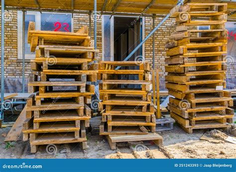 Empty Pallets At A Construction Site Reuse Of Wooden Pallets In Construction Royalty Free Stock