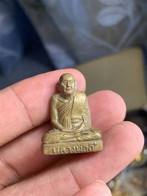 รูปหล่อหลวงพ่ออี๋ สัตหีบ Ennxo