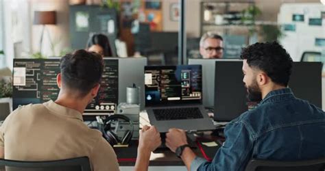 Coding Computer Screen And Fist Bump With Business People In Office Together From Back