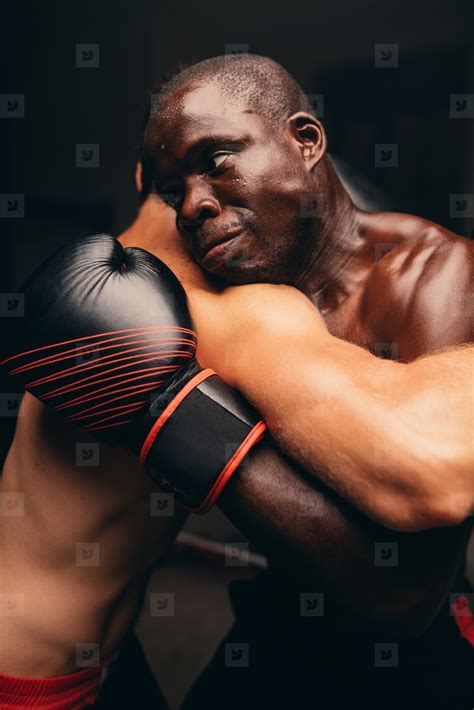 Two Male Athletes With Fighting With Boxing Gloves Photo 259450