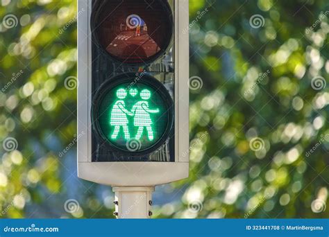 Dutch Traffic Light On A Rainbow Crossing With A Same Sex Couple Stock Photo Image Of Holland