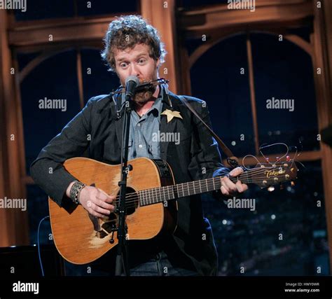 Glen Hansard On Guitar Perform As The Group The Sell Season During A
