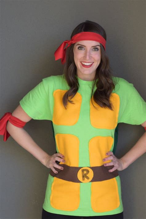 A Woman Wearing A Costume Made To Look Like The Teenage Mutant Girl From Tmnt