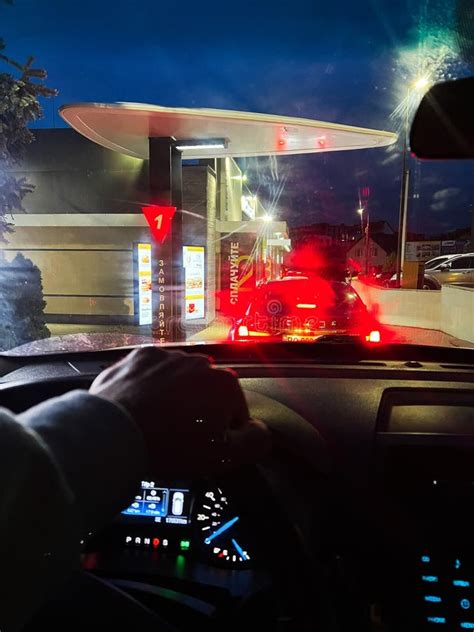 Driver Waiting In Mcdrive Line At Mcdonald S Fast Food Drive Through At